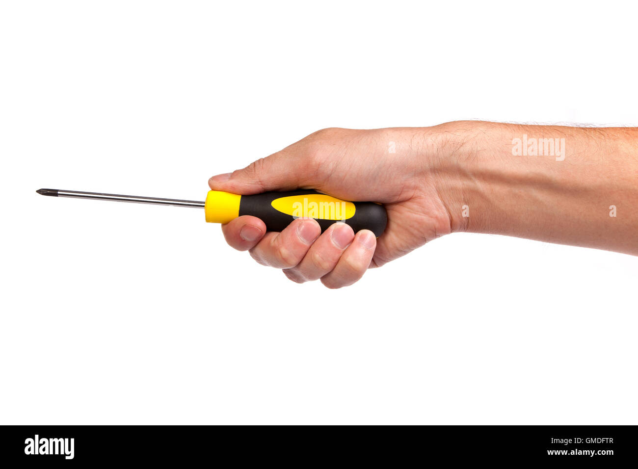 Hand holding a yellow and black screwdriver Stock Photo - Alamy