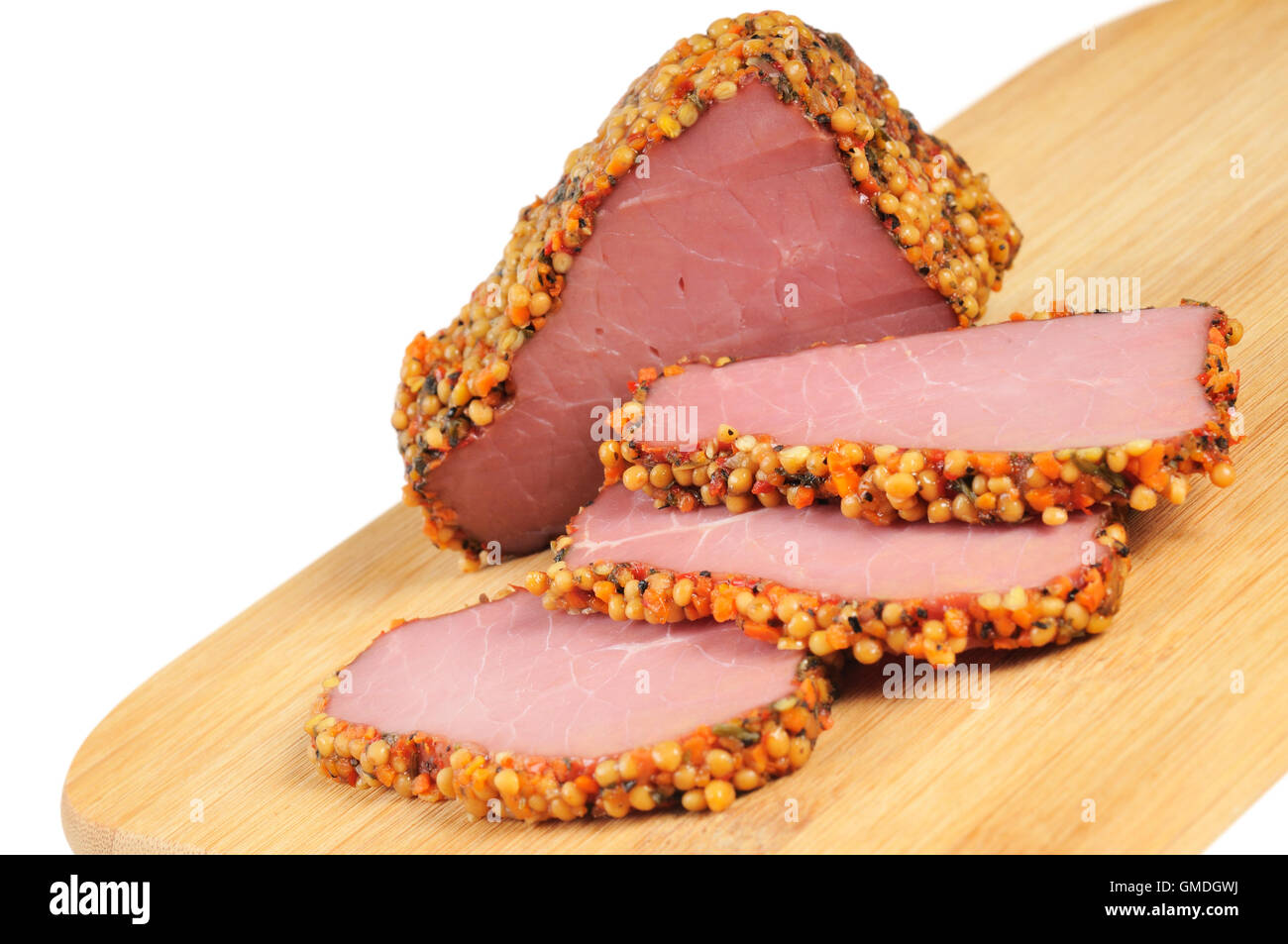 Piece of a ham with spices Stock Photo - Alamy