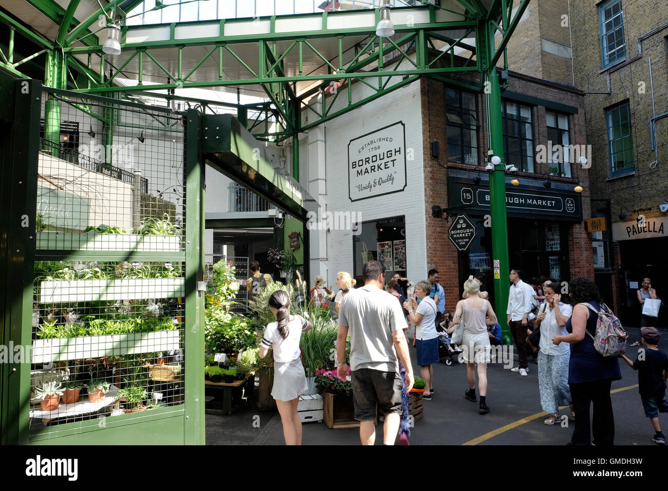 Shoppers walking in Borough market Stock Photo - Alamy