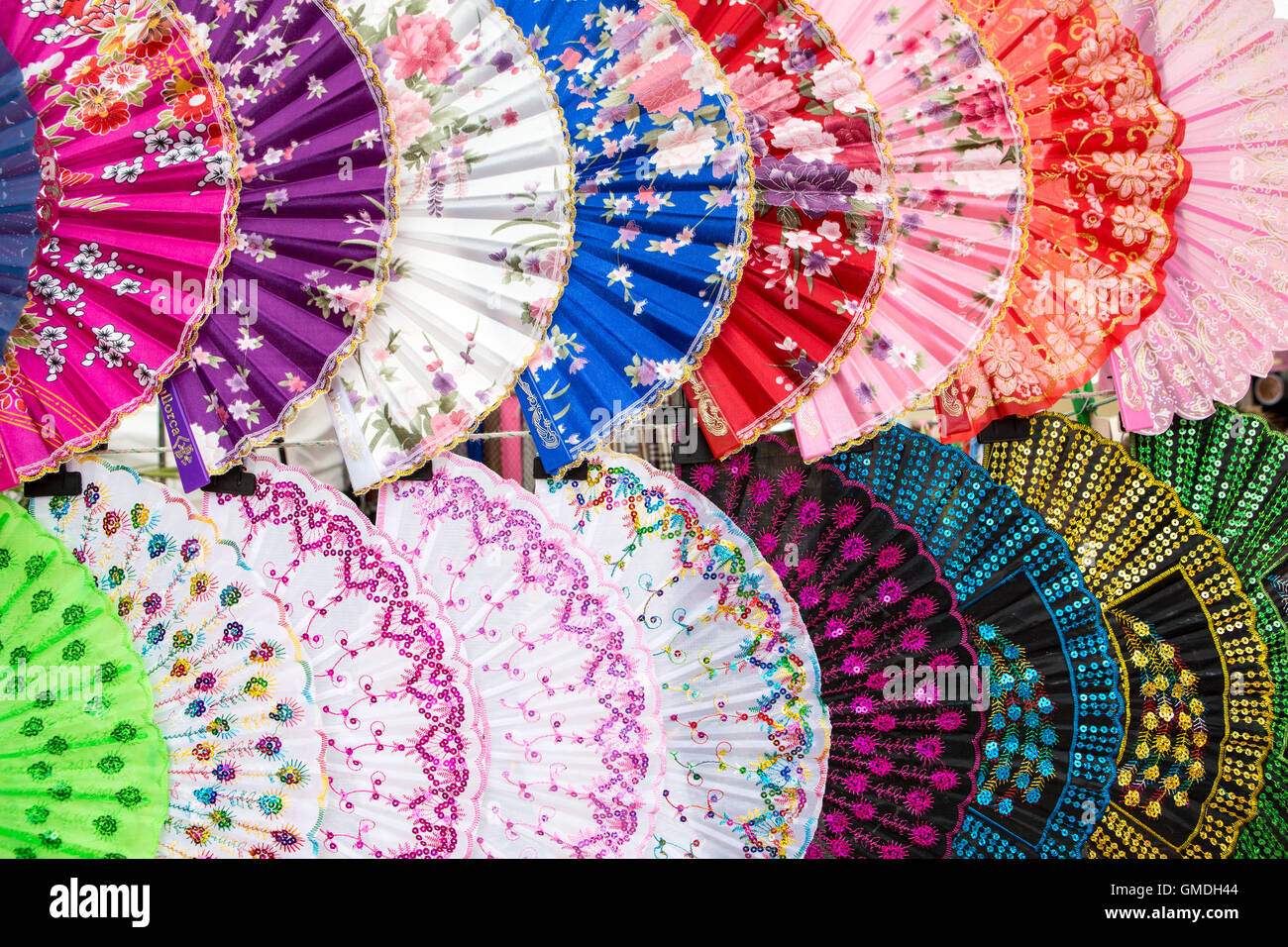 Hand fans hi-res stock photography and images - Alamy