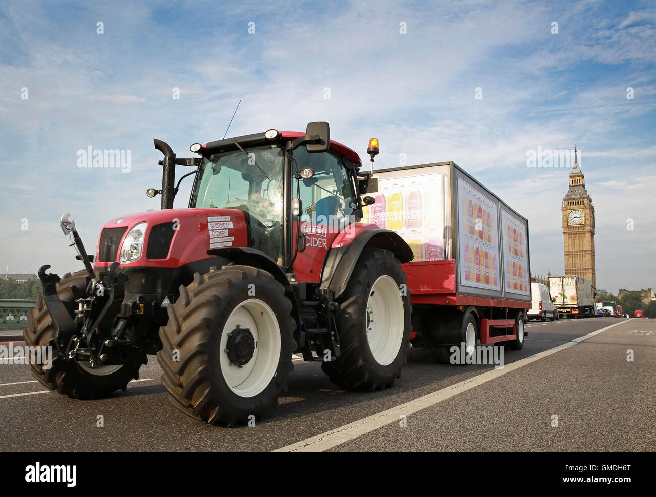 A tractor travels across Westminster Bridge in central London to ...