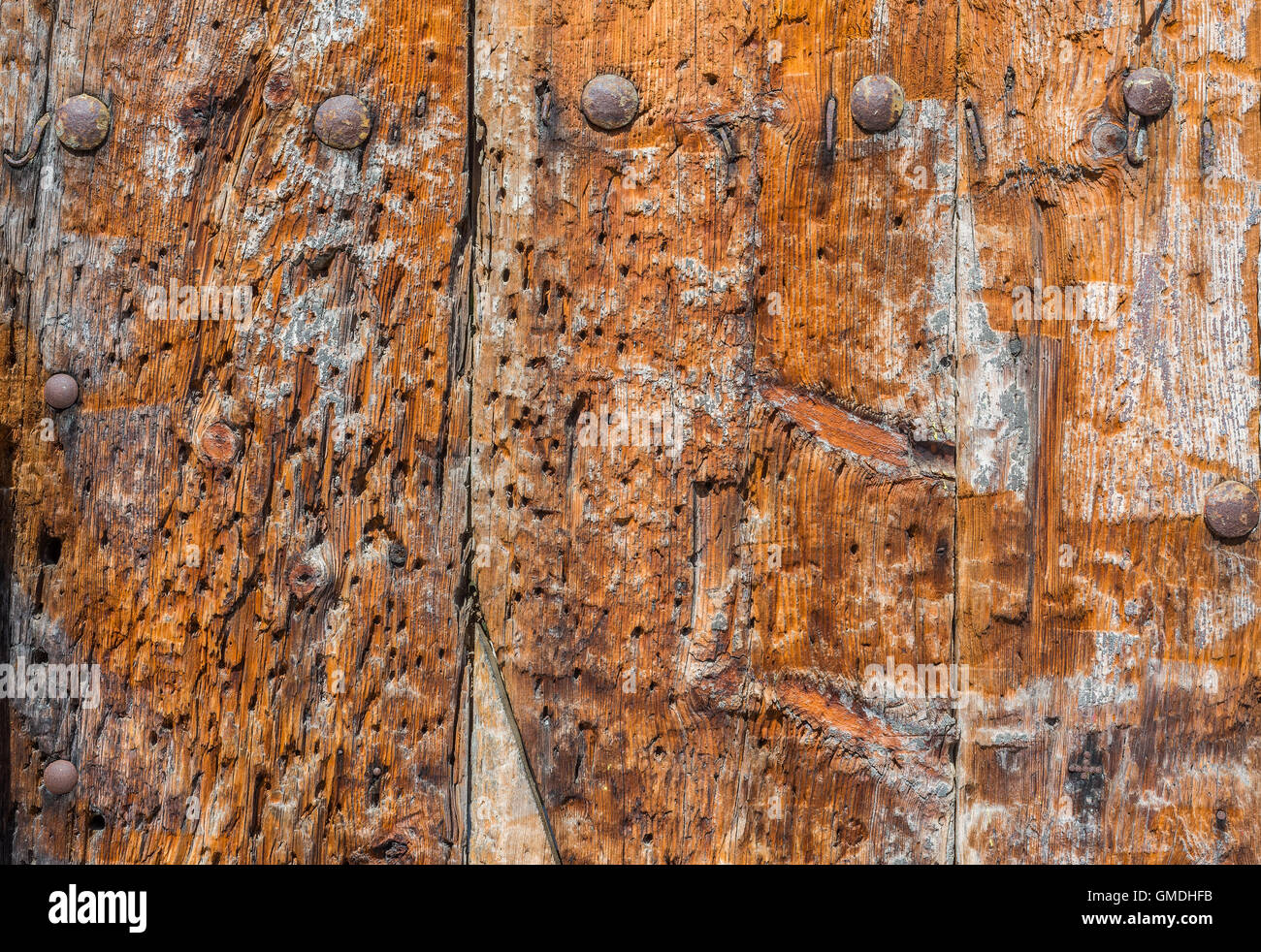 Weathered wooden panel background with a metallic rusty screws Stock ...