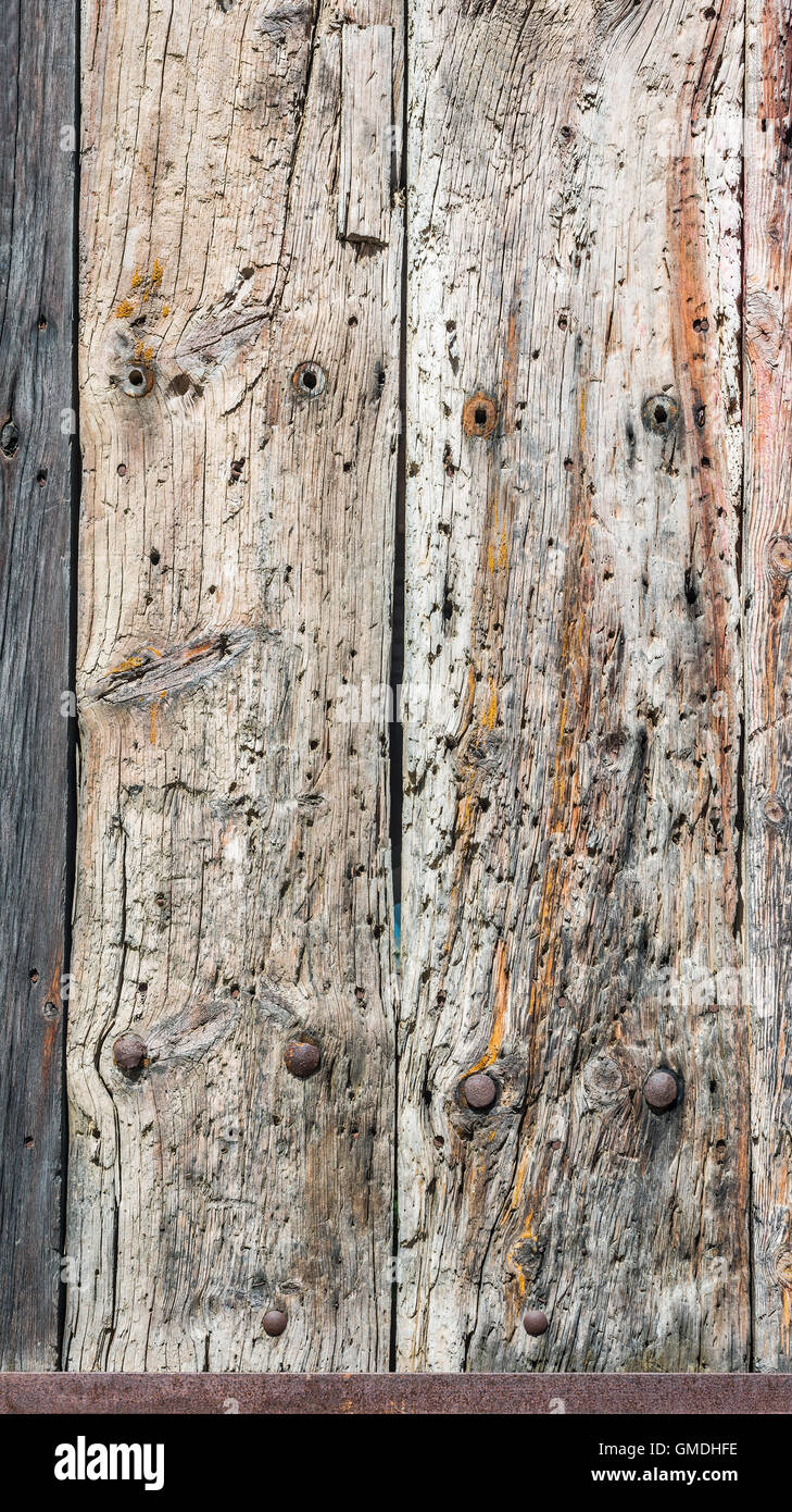 Weathered wooden panel background with a metallic rusty screws Stock ...