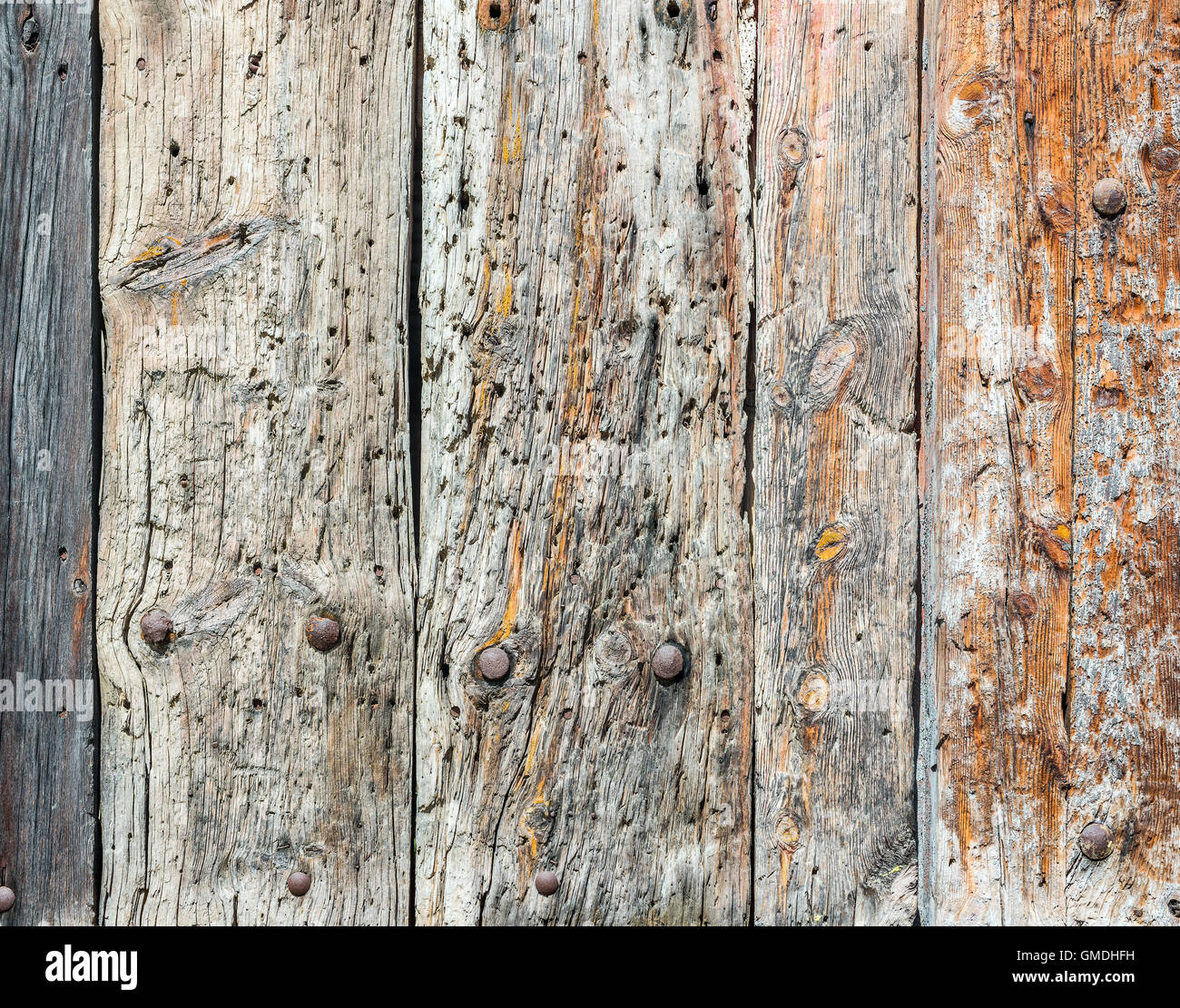 Weathered wooden panel background with a metallic rusty screws Stock ...