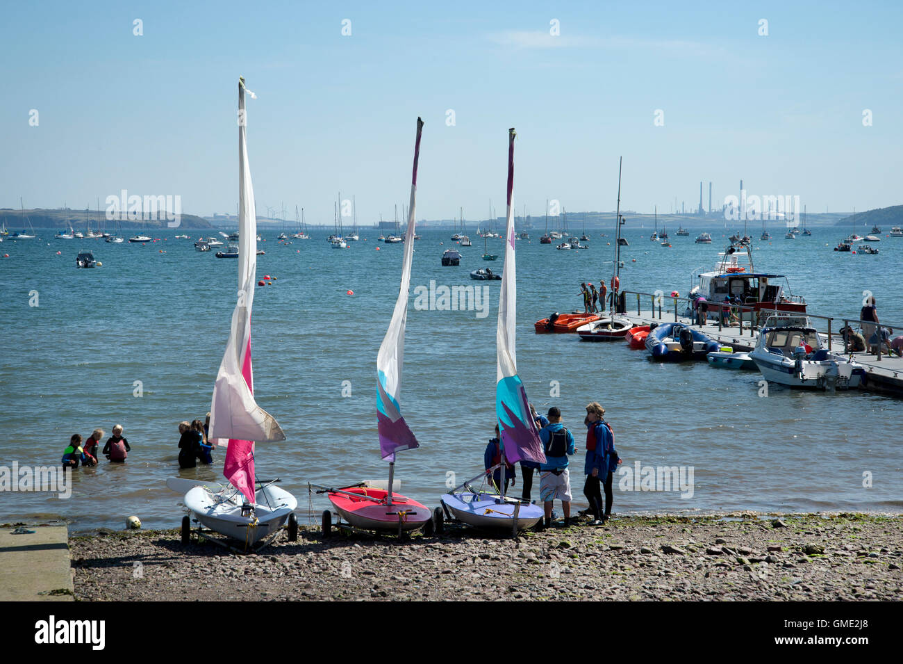 Dale , Wales, August 2016. The harbour. Small sailing dinghies on the ...