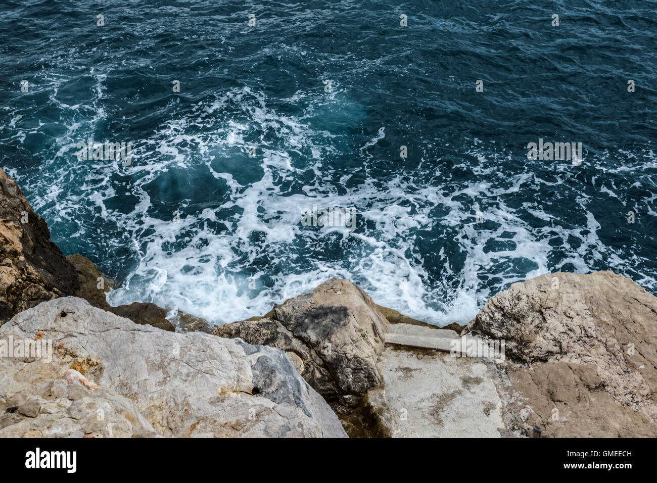 Under the cliff Stock Photo - Alamy
