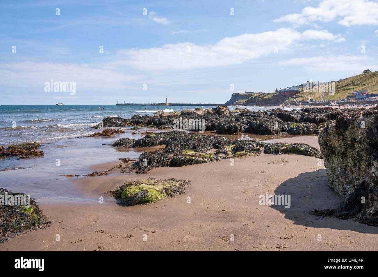 A view of the beach and harbour at Whitby,North Yorkshire Stock Photo ...