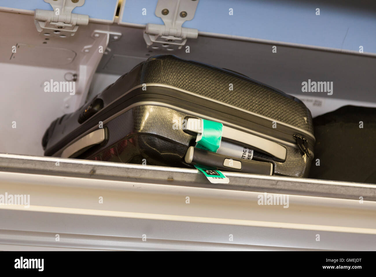 Carry on luggage bag passenger locker High Resolution Stock Photography ...