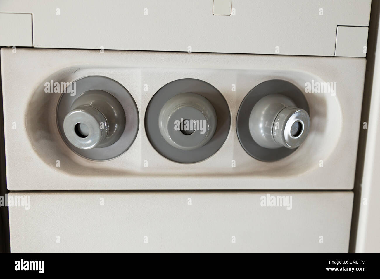 Cool air nozzles / nozzle array above passenger / passengers seat in an ...