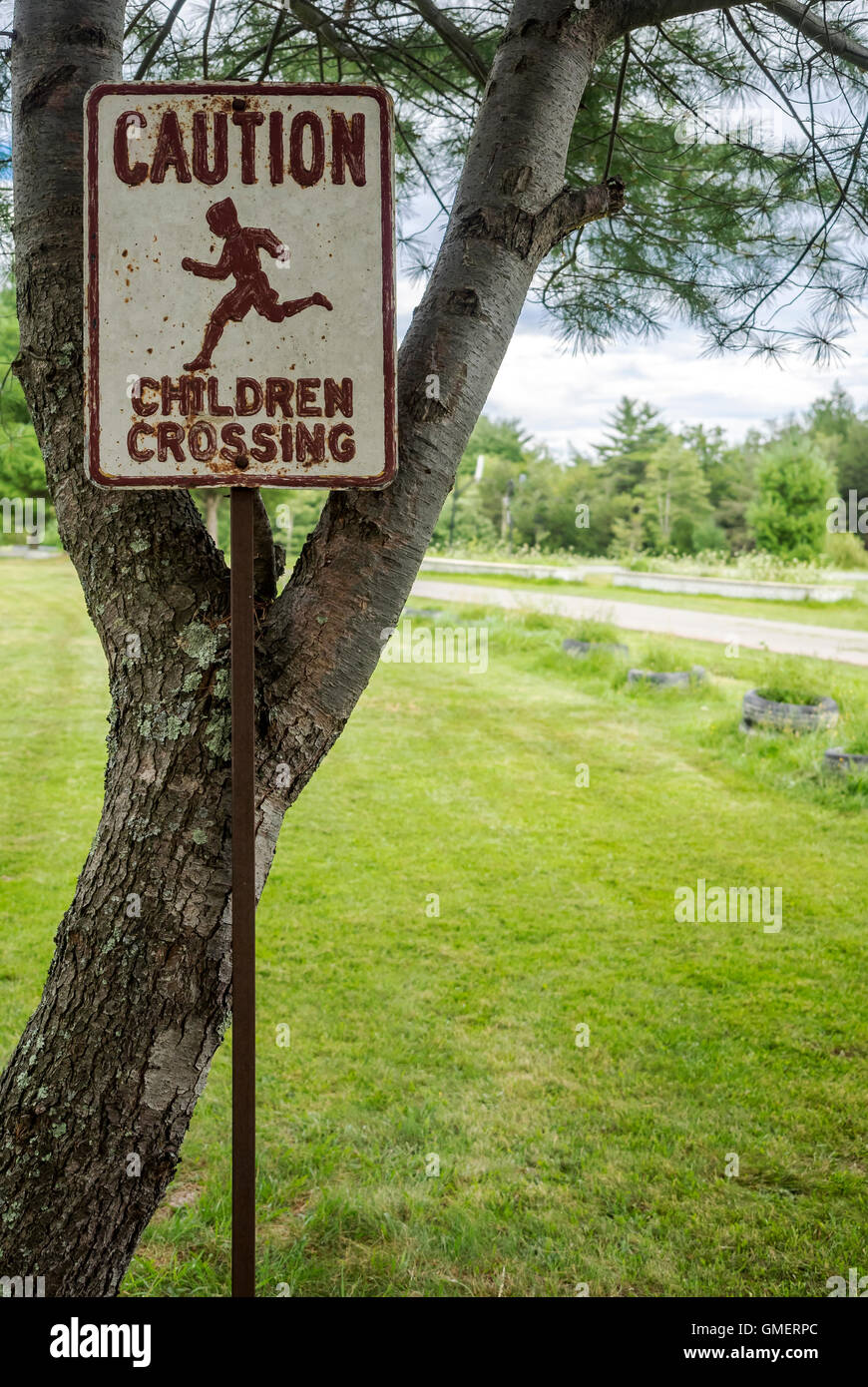 Vintage road sign “Caution Children crossing” Stock Photo - Alamy