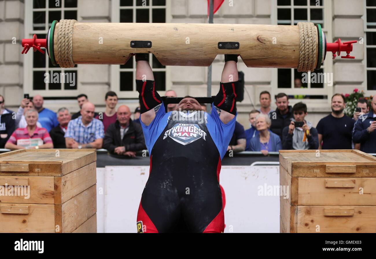 Ed Hall from England lifts a log during the UK Strongest Man 2016 heats ...