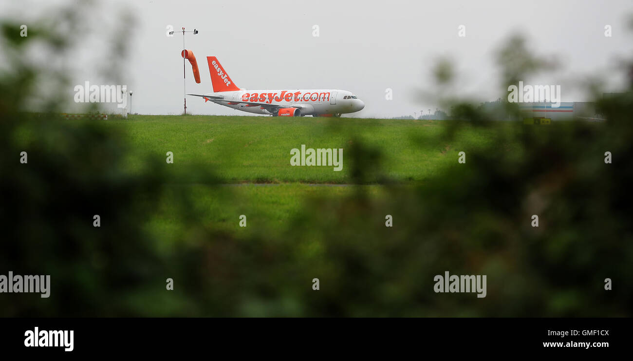 An Easyjet plane as it takes off from Liverpool John Lennon Airport ...