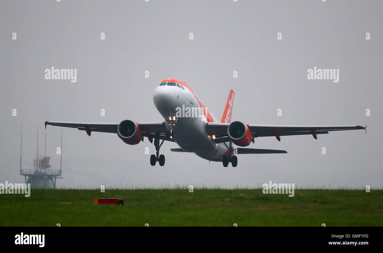 An Easyjet plane as it takes off from Liverpool John Lennon Airport ...