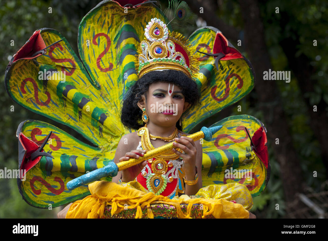 Dhaka, Bangladesh. 25th Aug, 2016. A boy dressed like Lord Sri Krishna ...
