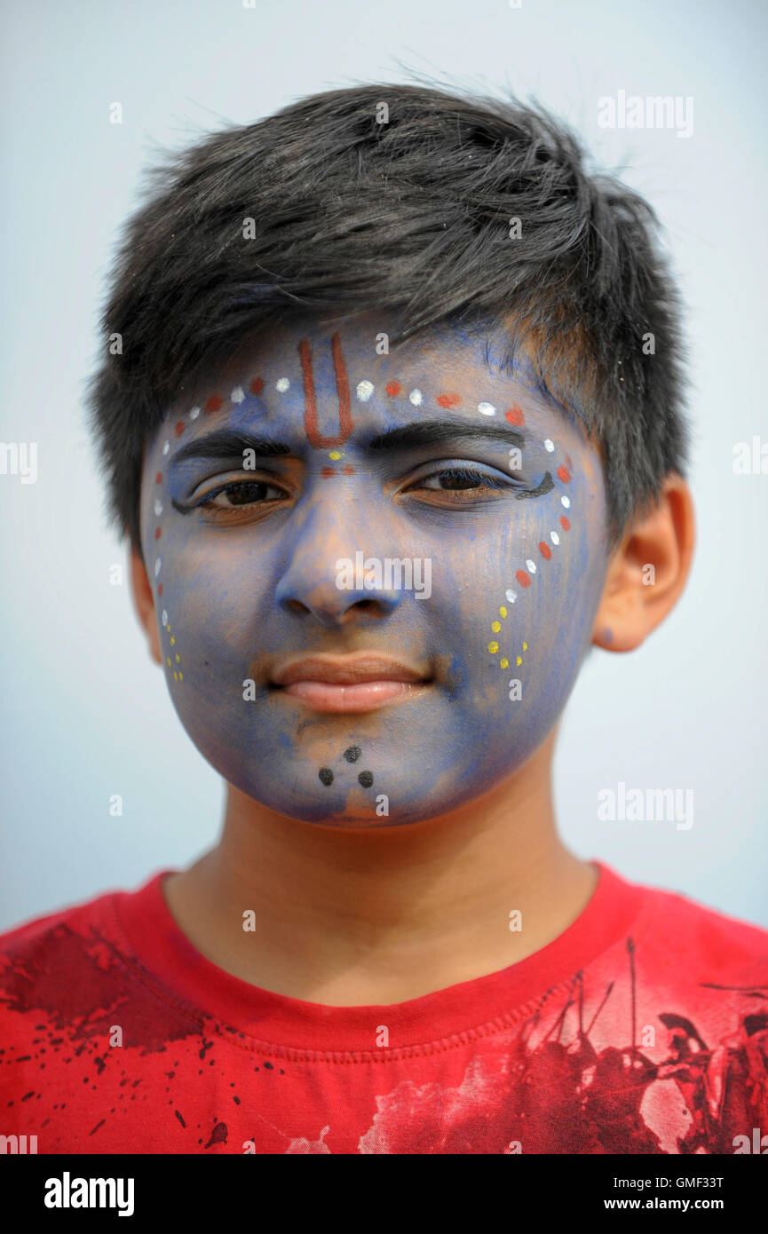 London, UK. 25 August 2016. A young boy wears the blue facepaint of ...