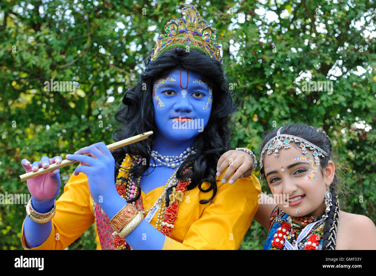 London, UK. 25 August 2016. A couple dress as (L to R) Lord Krishna and ...