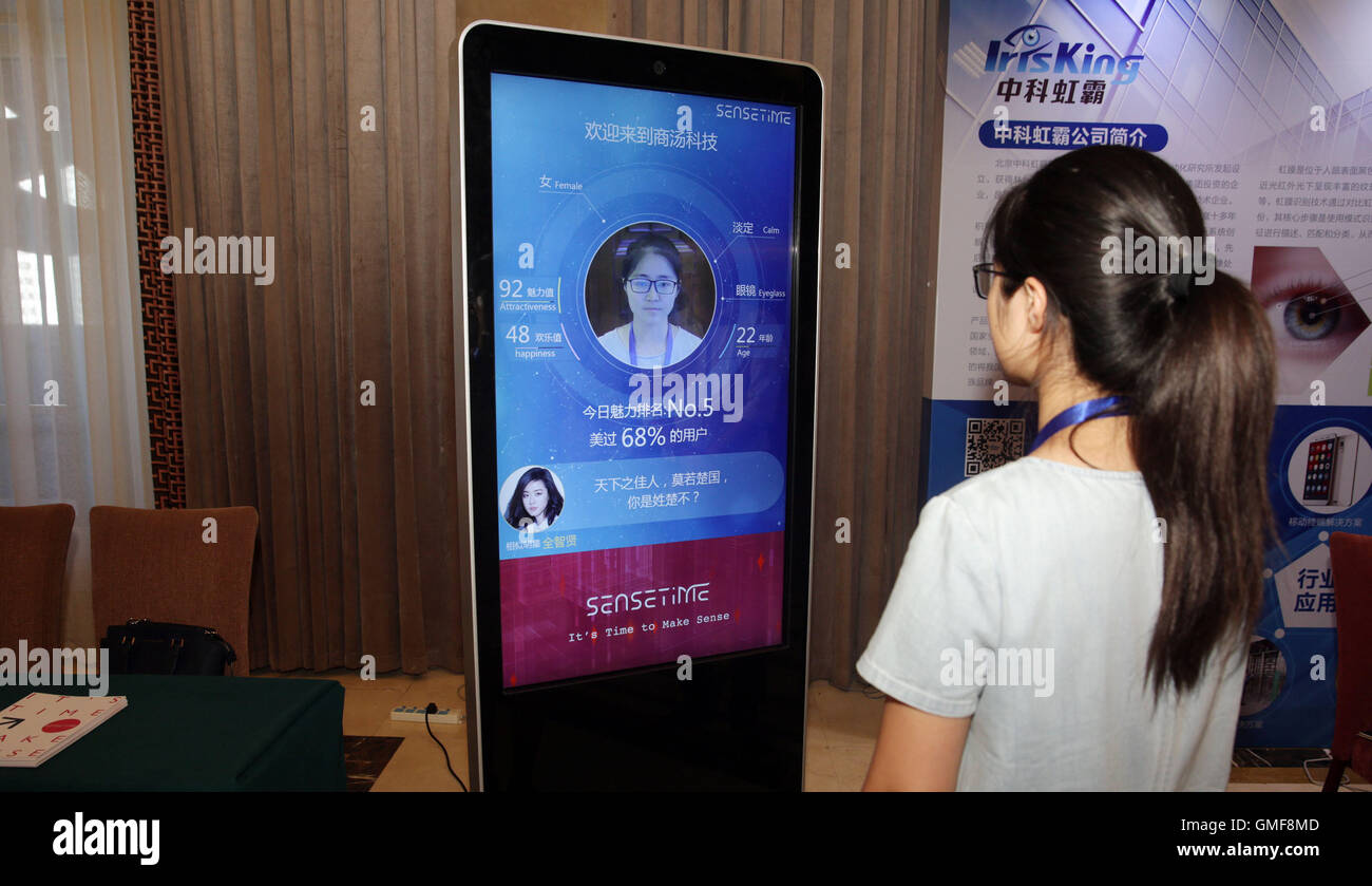 Beijing, China. 26th Aug, 2016. A staff member demonstrates a face ...