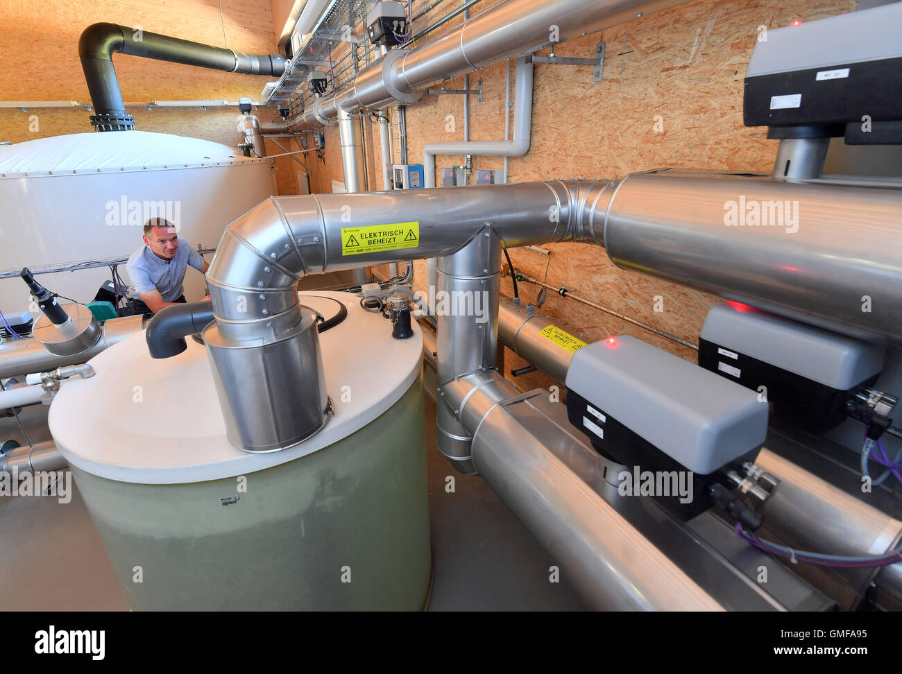 Bad Elster, Germany. 26th Aug, 2016. Employee André Glass works in the ...