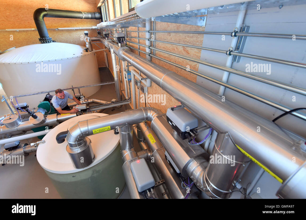 Bad Elster, Germany. 26th Aug, 2016. Employee André Glass works in the ...