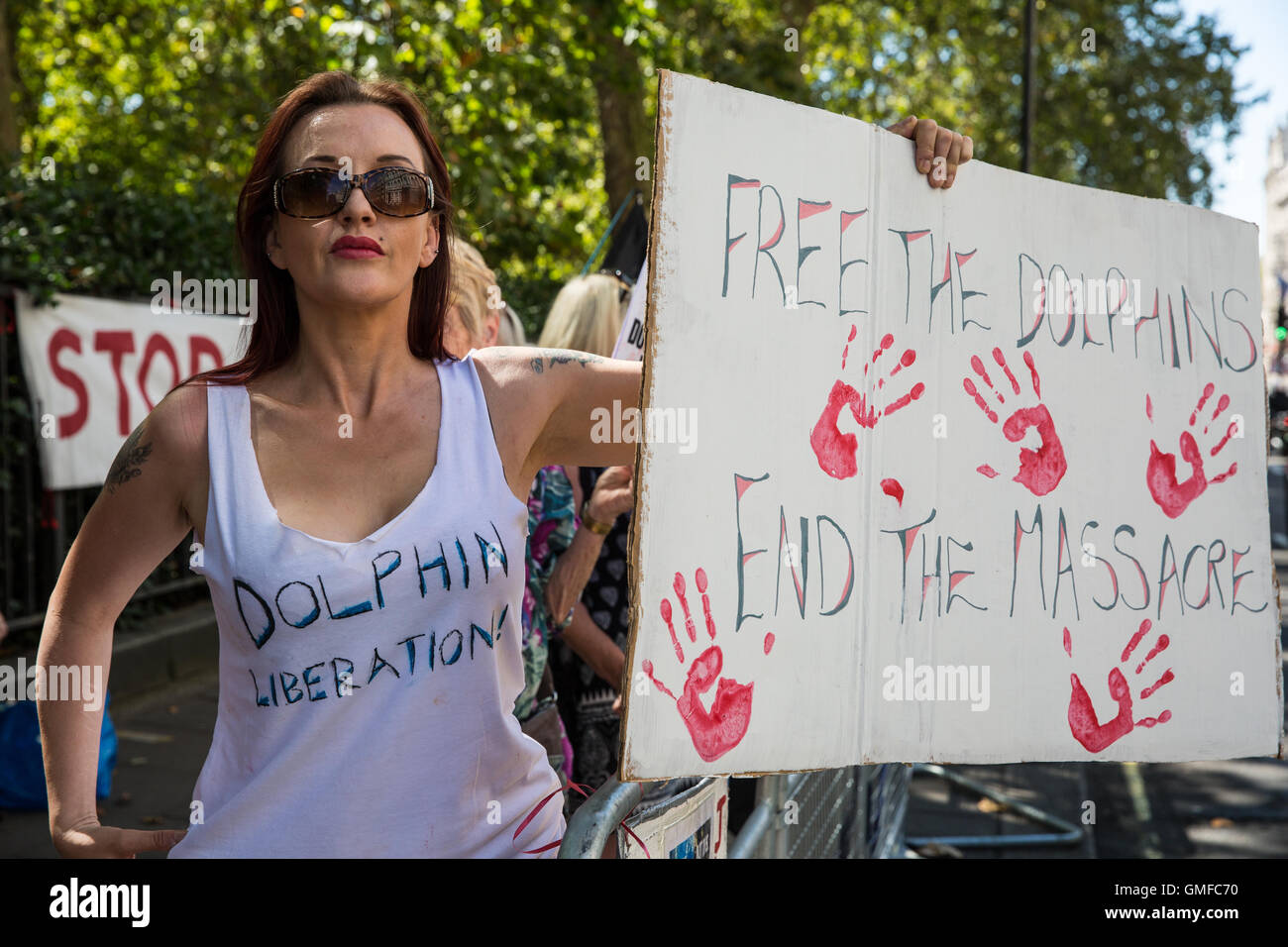 London, UK. 26th Aug, 2016. A dolphin liberation activist protests ...
