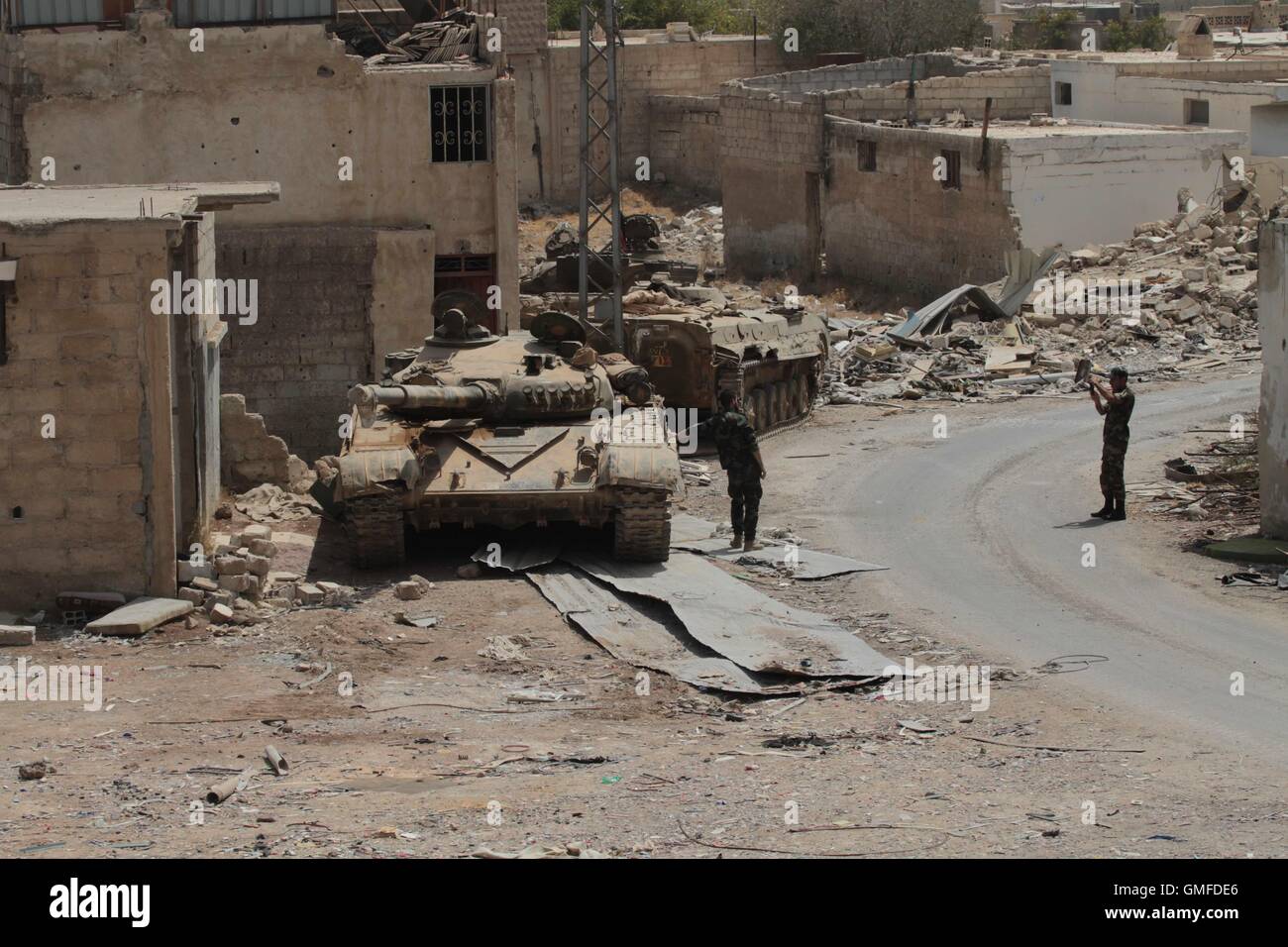 Daraya, Syria. 26th Aug, 2016. A Syrian soldier poses for photos in ...