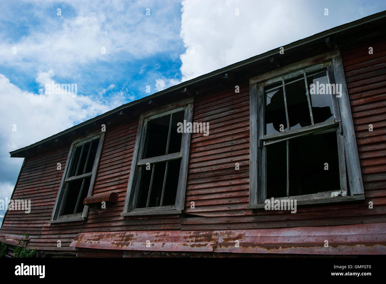 Three broken windows Stock Photo - Alamy