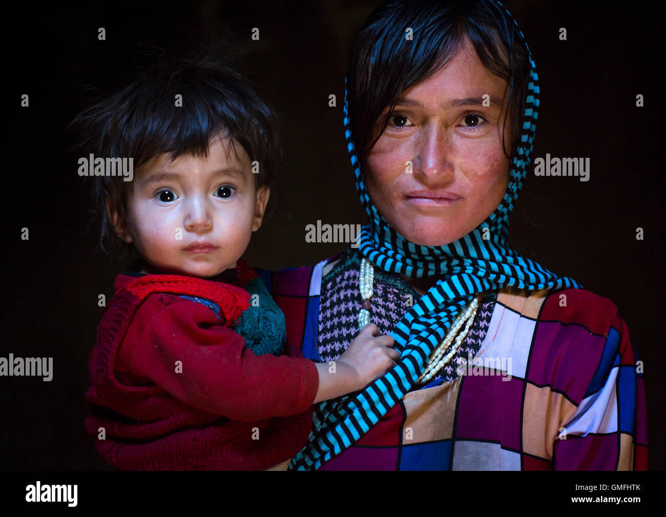 Portrait of an afghan mother with her son, Badakhshan province, Zebak ...