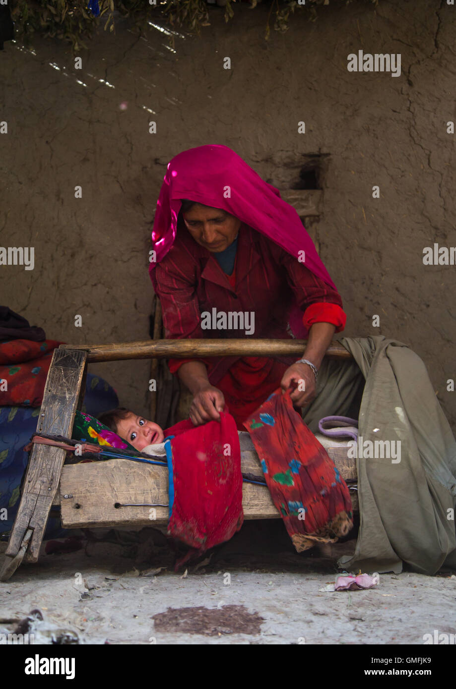 Mother craddle baby hi-res stock photography and images - Alamy