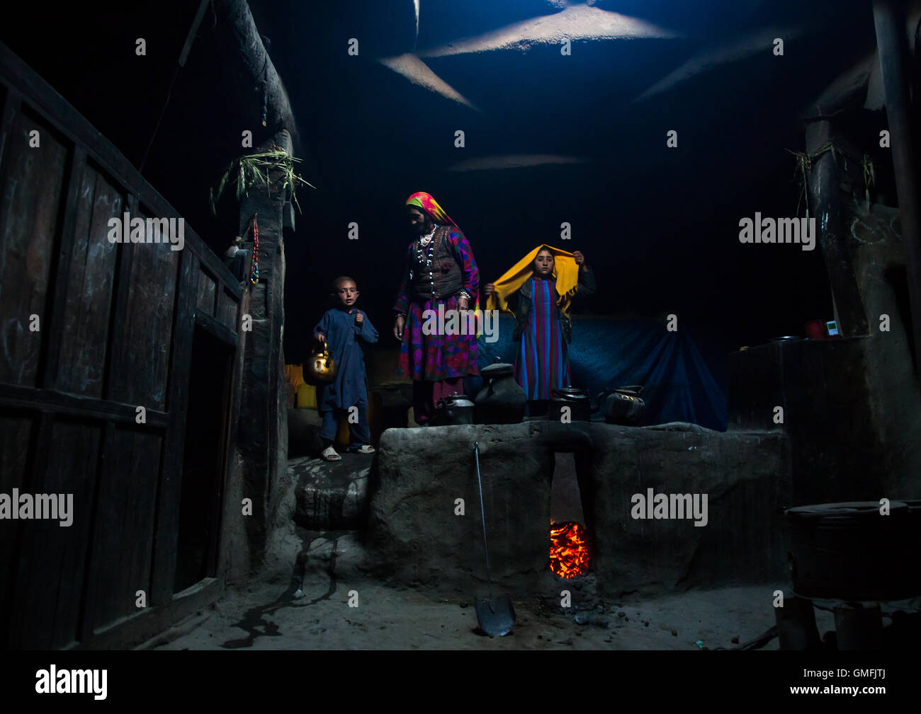 Afghan family inside their traditional pamiri house, Badakhshan ...