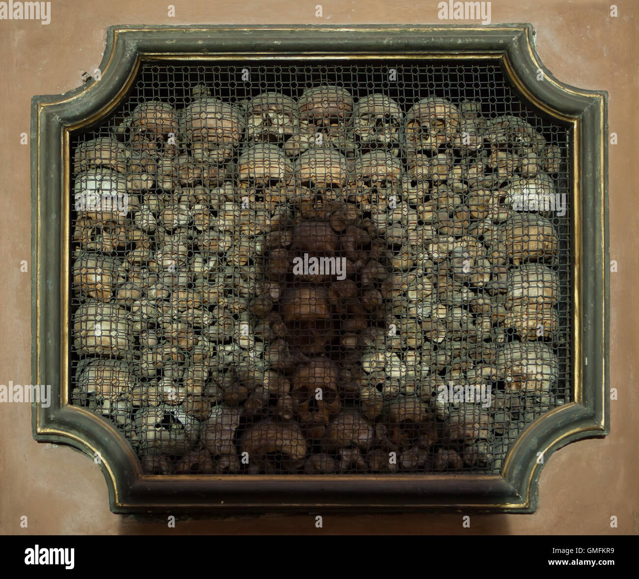 Human skulls and bones in the ossuary in the Church of San Bernardino ...