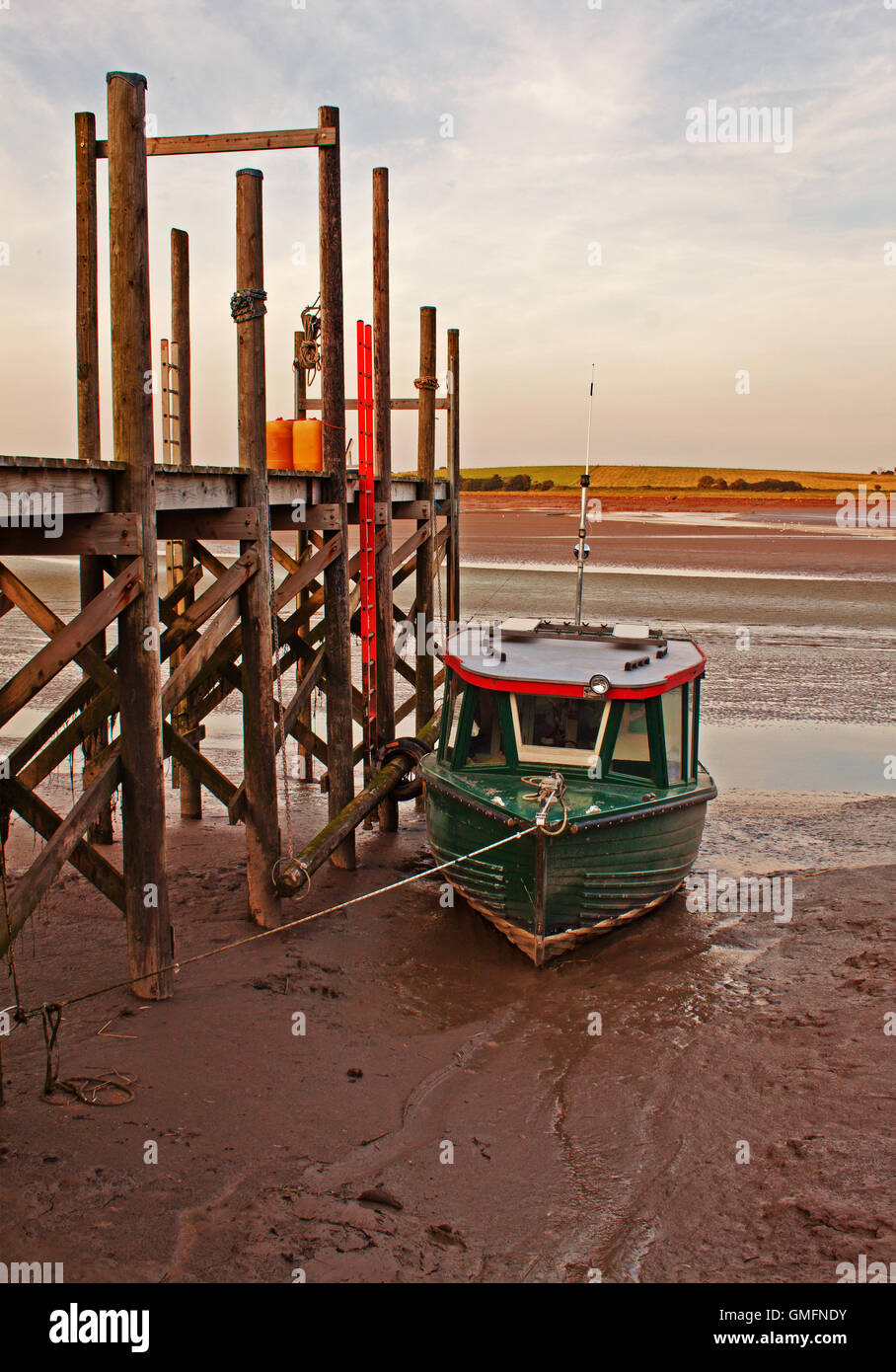 Moored in the silted river Stock Photo - Alamy