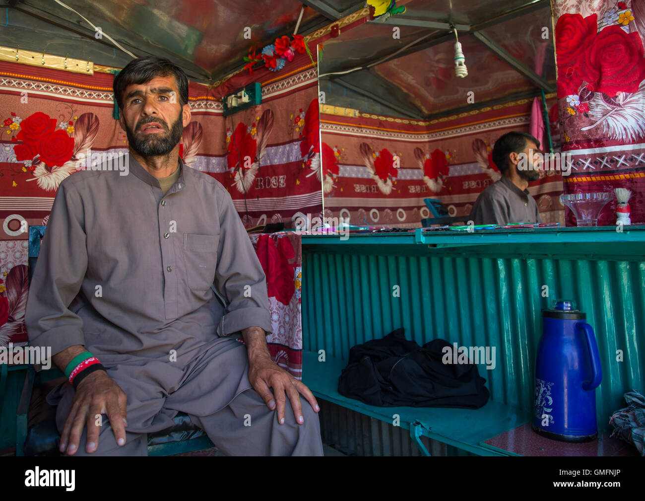 Afghan barber in the market, Badakhshan province, Ishkashim ...