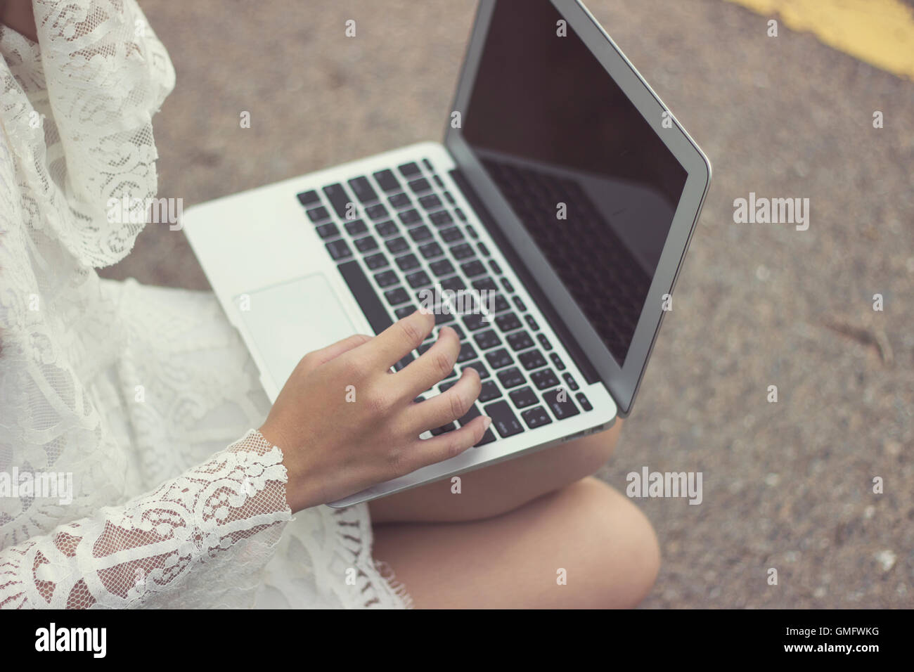 lady use to laptop in garden Stock Photo - Alamy
