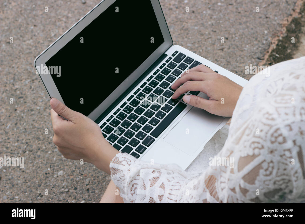 lady use to laptop in garden Stock Photo - Alamy