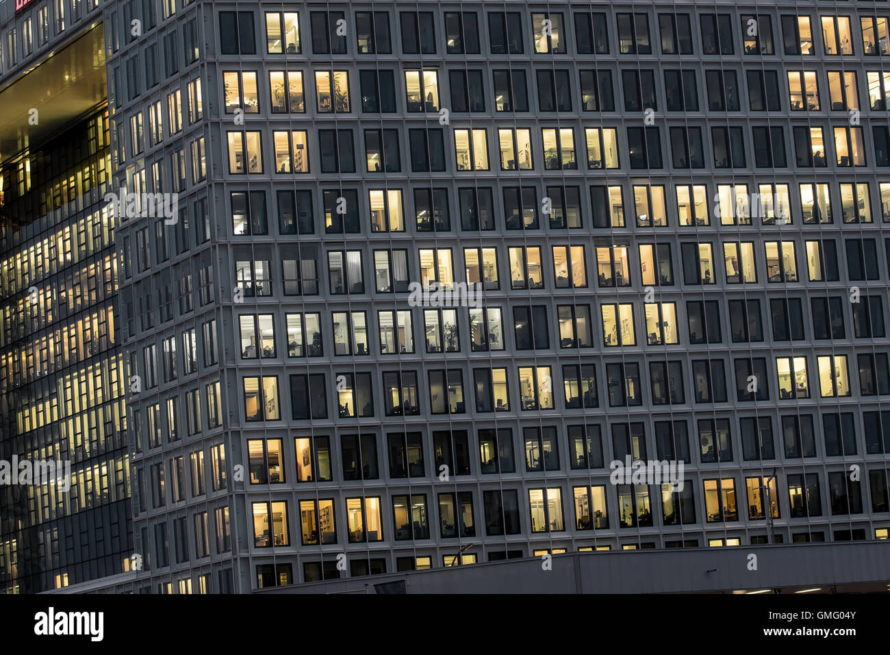 Illuminated windows office building night hi-res stock photography and ...