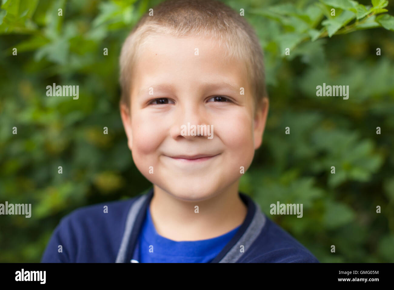 Portrait of a boy in nature Stock Photo - Alamy
