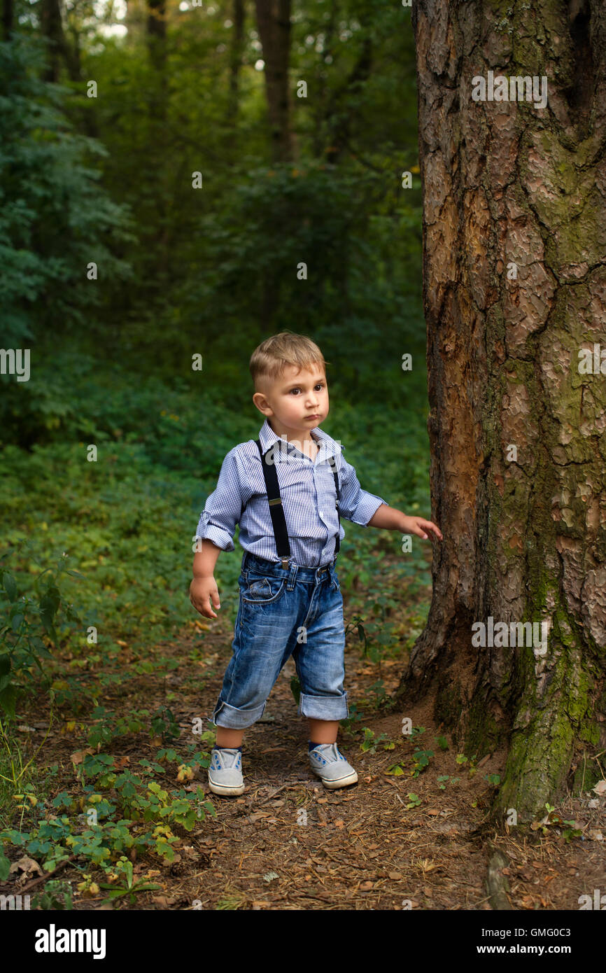 Boy in stylish clothing posing for the camera Stock Photo - Alamy