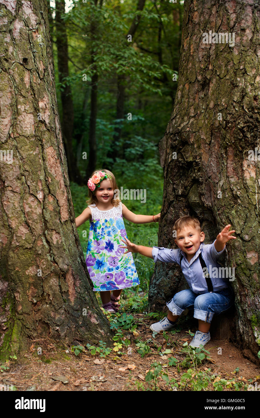 Cheerful children playing in the park Stock Photo - Alamy