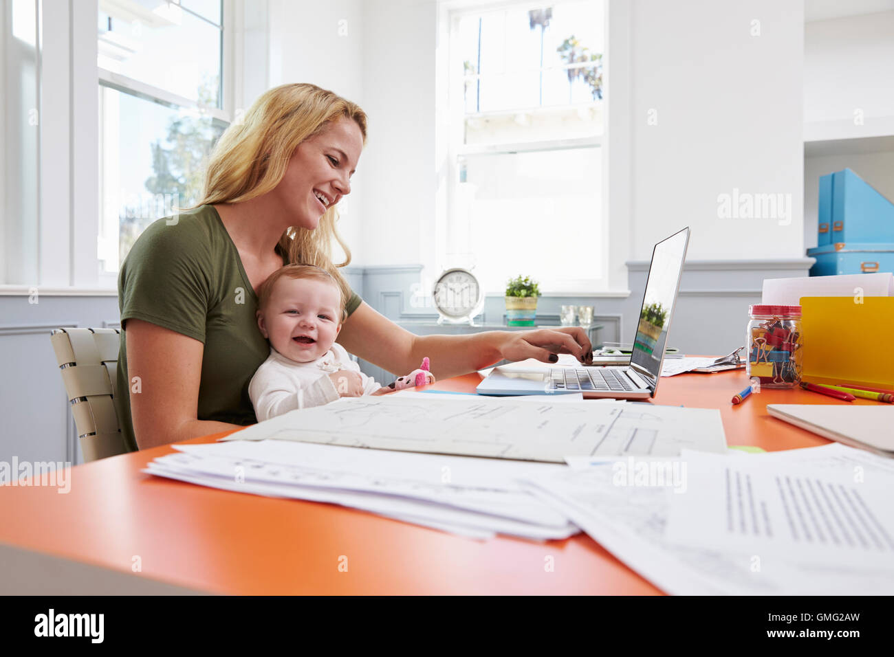 Working mother busy children stress hi-res stock photography and images ...