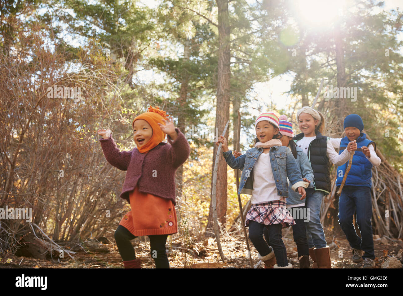 Asian children playing in forest hi-res stock photography and images ...