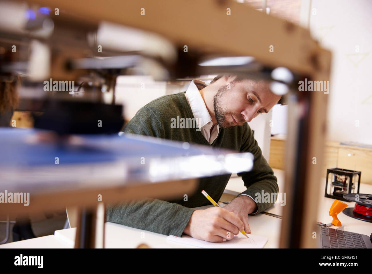 Designer Drawing Sketch In 3D Design Studio Stock Photo - Alamy