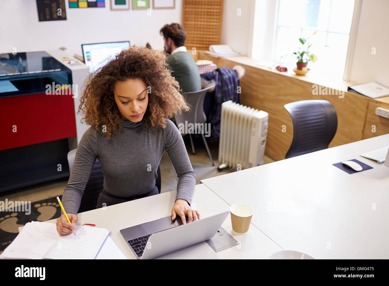 Staff In Design Office With CAD System For Laser Cutter Stock Photo - Alamy