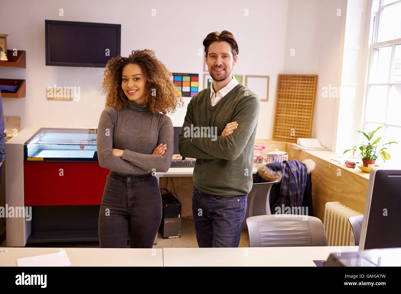 Portrait Of Designers With CAD System For Laser Cutter Stock Photo - Alamy