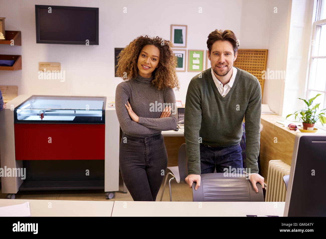 Portrait Of Designers With CAD System For Laser Cutter Stock Photo - Alamy