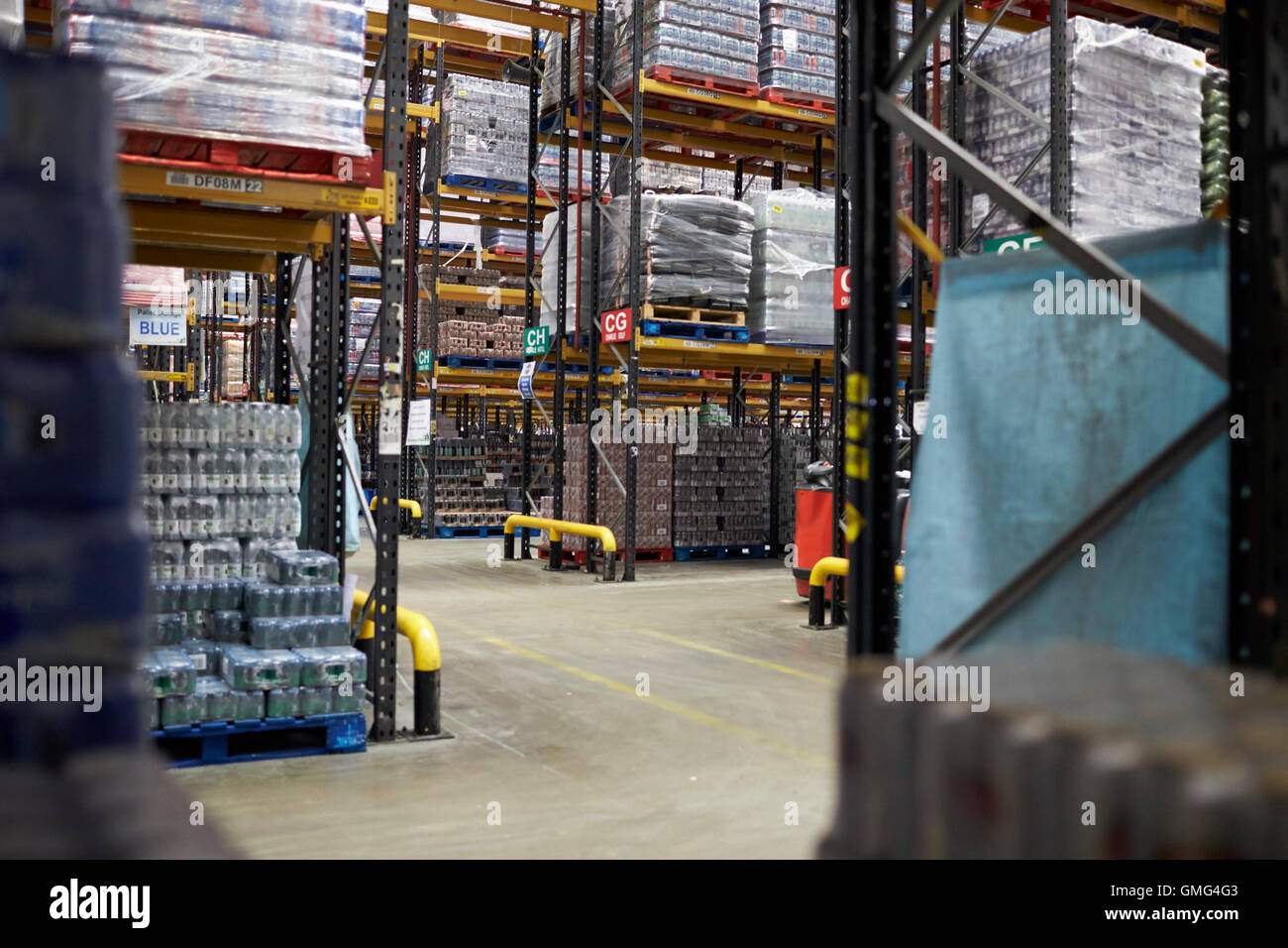 Aisles between storage racks in a distribution warehouse Stock Photo ...