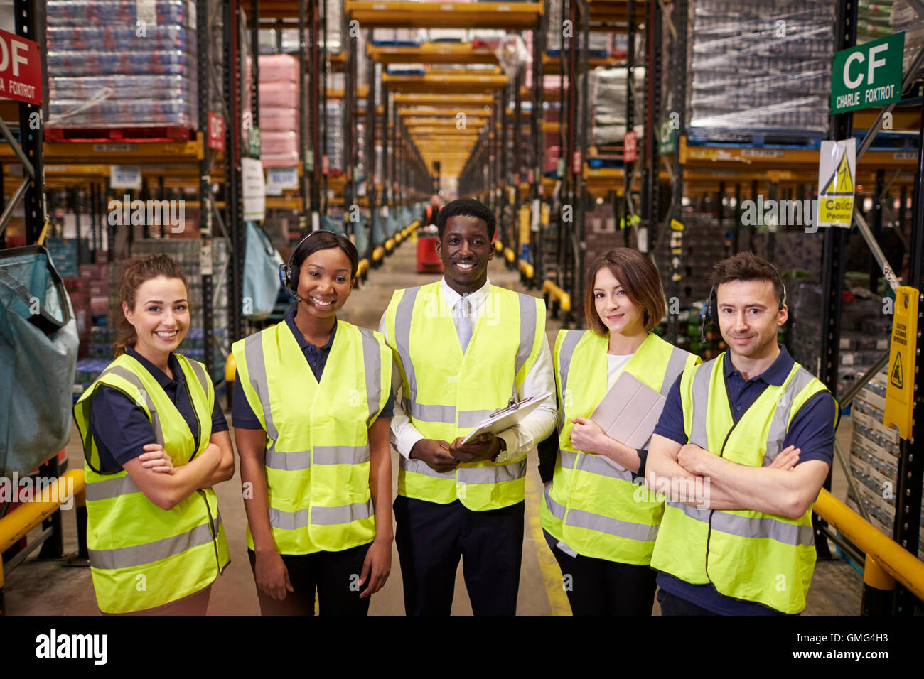 Warehouse staff group portrait, elevated view Stock Photo - Alamy
