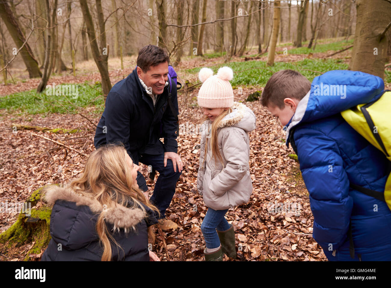 Family exploring nature together in a wood, close up Stock Photo - Alamy