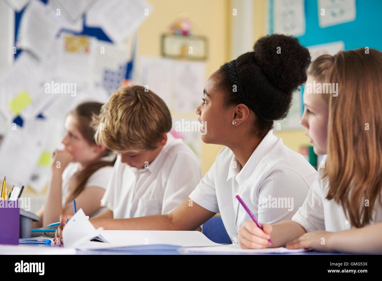 A row of primary school children in class, close up Stock Photo - Alamy