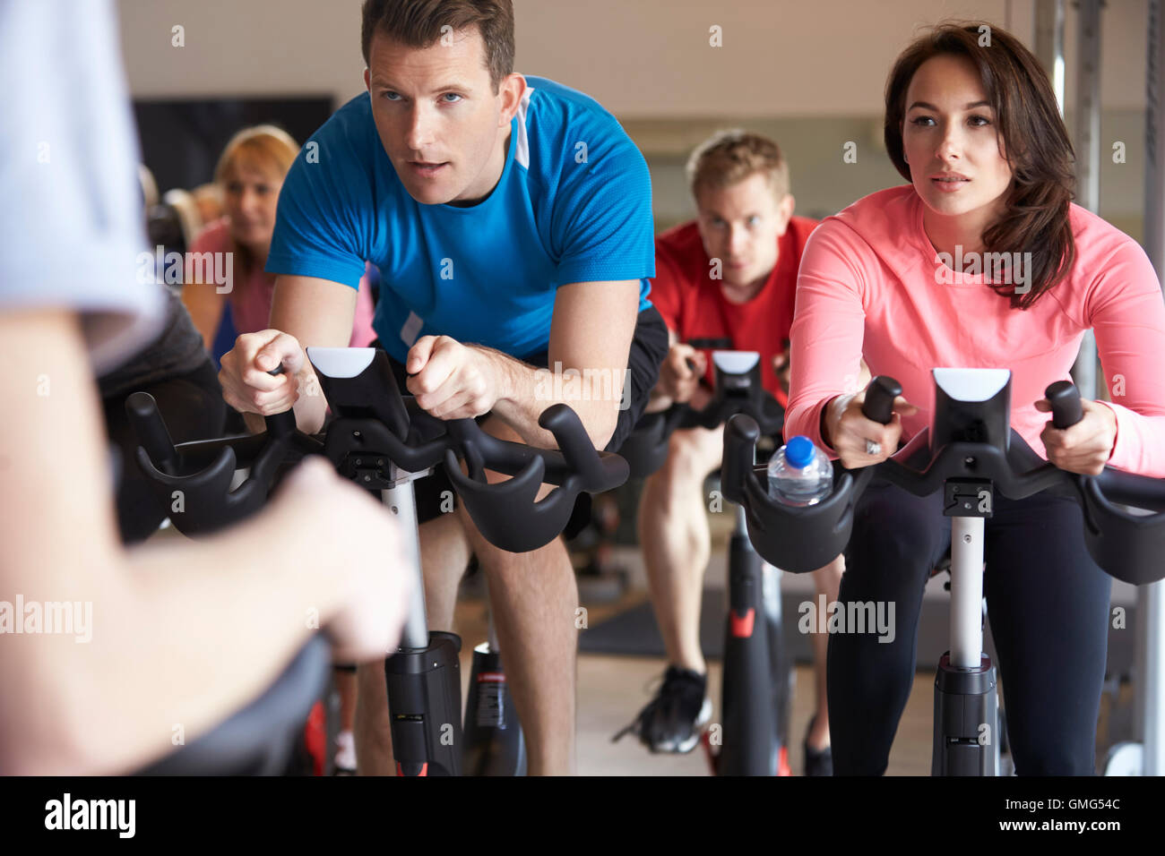 Spinning class young hi-res stock photography and images - Alamy