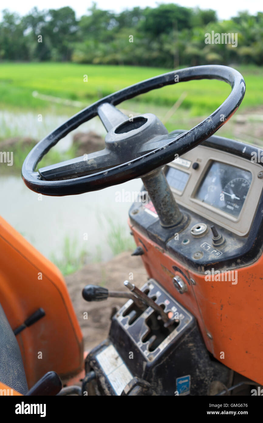 Tractor in a rice field Stock Photo - Alamy